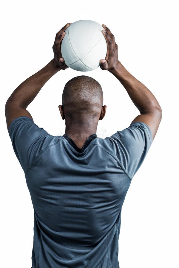 Rear View of Athlete Throwing Rugby Ball Stock Photo - Image of ...