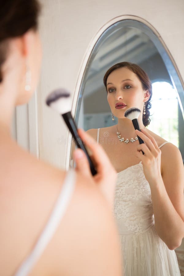 Rear View of Beautiful Bride Applying Makeup Reflecting on Mirror Stock ...