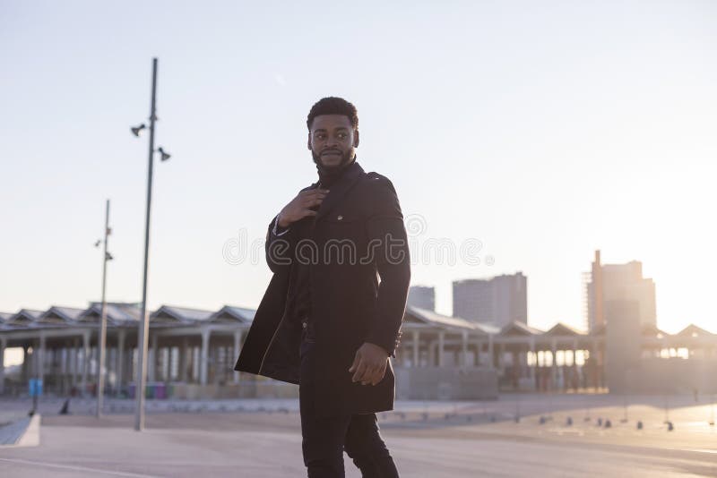 Black Man Rear View Afro Walking Stock Photos - Free & Royalty-Free ...