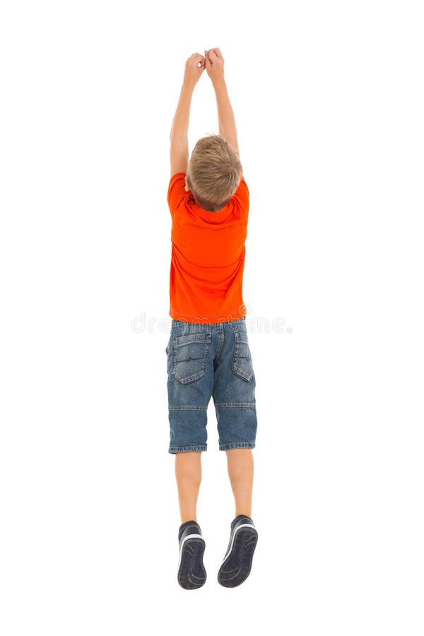 Rear view boy jumping stock photo. Image of fashion, childhood - 40214460
