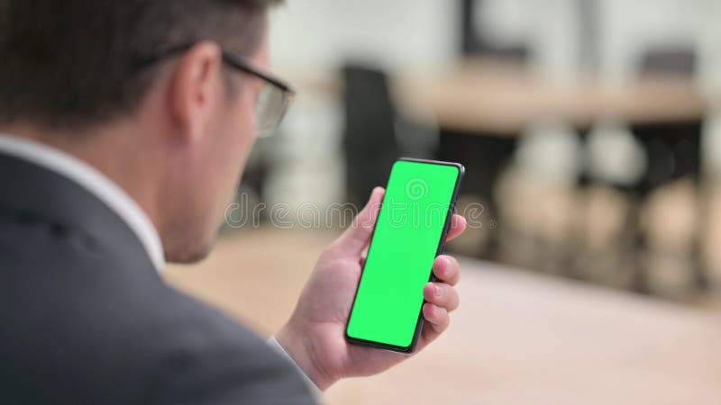Rear View of Businessman Using Smartphone with Chroma Screen Stock ...