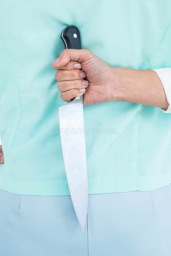 Woman Hiding Knife Stock Photos - Free & Royalty-Free Stock Photos from ...
