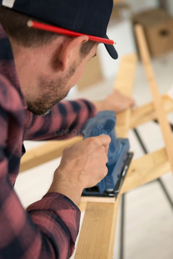 Rear View Carpenter Using Sander Stock Photo - Image of carpenter ...