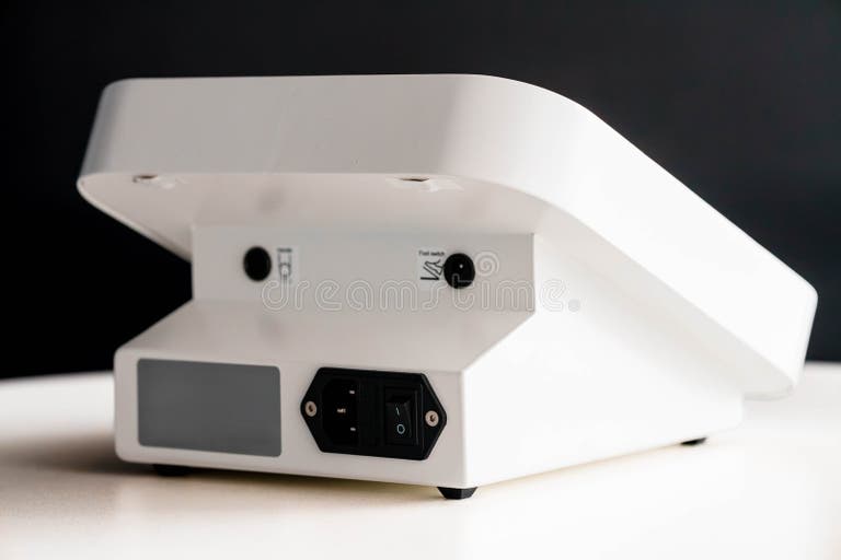 Rear View Close-Up of Modern White Electronic Device Showing Power ...