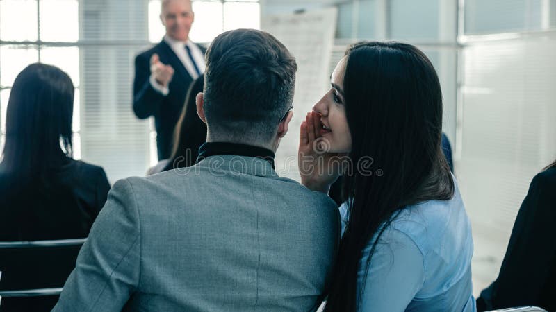 Colleagues Discuss Something during a Business Presentation Stock Photo ...