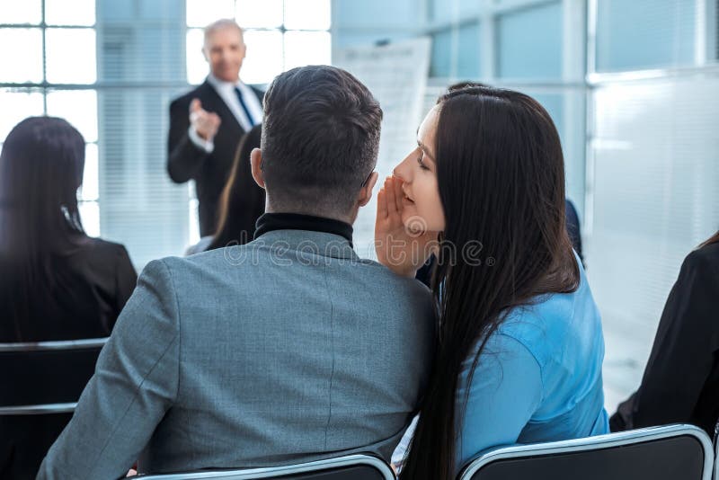 Colleagues Discuss Something during a Business Presentation Stock Photo ...
