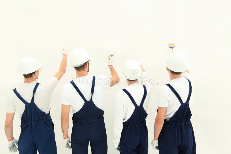 Rear View.construction Workers Paint the Wall Stock Image - Image of ...