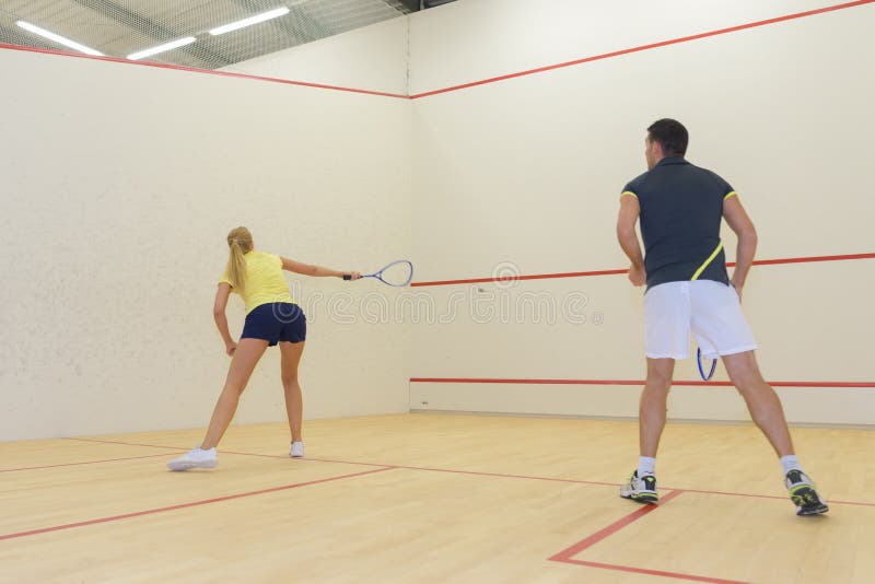 Rear View Couple Playing Squash Stock Photo - Image of indoors, view ...