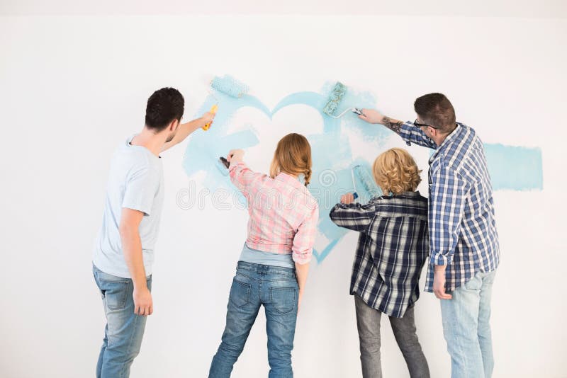 Rear View of Couples Painting Wall in New Home Stock Photo - Image of ...