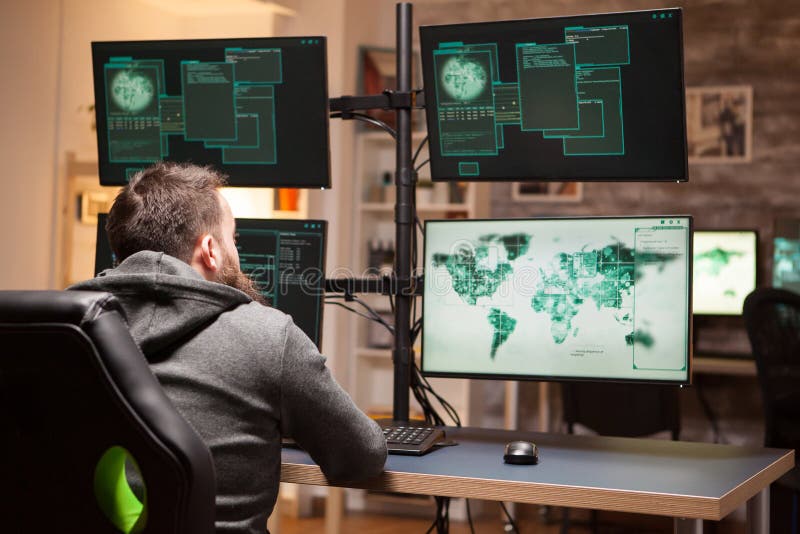 Rear View of Dangerous Hacker Typing a Malware Stock Image - Image of ...