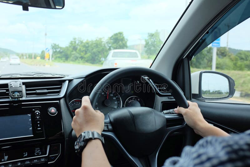 Rear View of a Driver Holding Steering Wheel Stock Photo - Image of ...