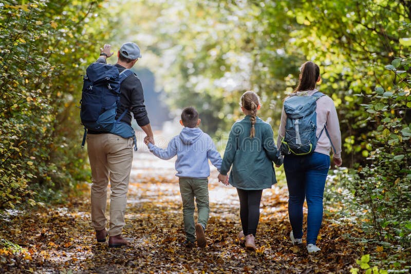 Rear View of Family with Kids Walking in Forest. Stock Image - Image of ...