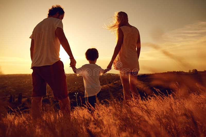 Rear View of Family Standing in Nature at Sunset Stock Photo - Image of ...