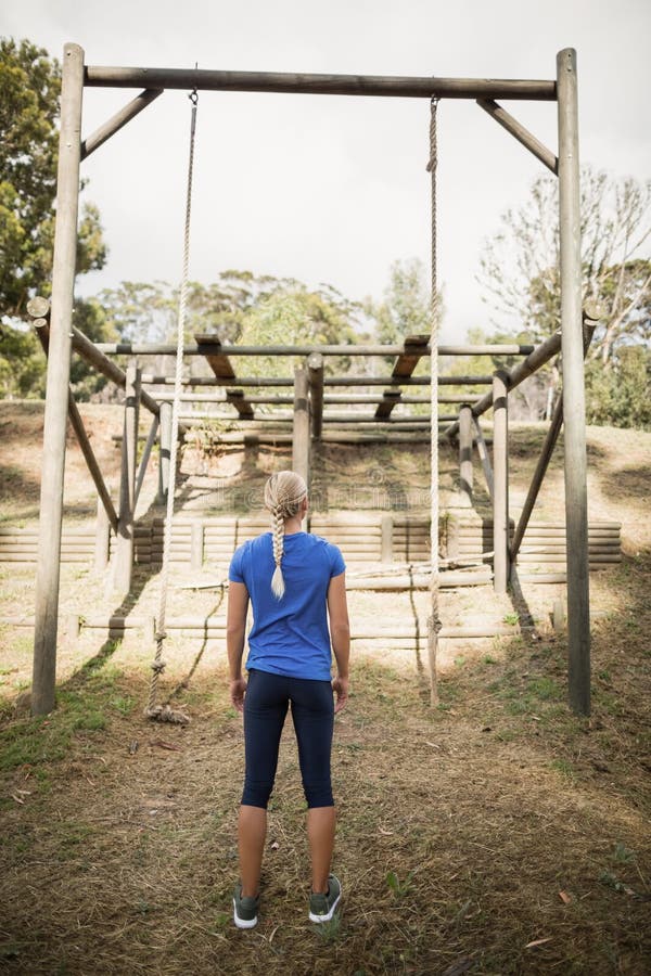 Rear View of Fit Woman Looking at Rope during Obstacle Course Stock ...