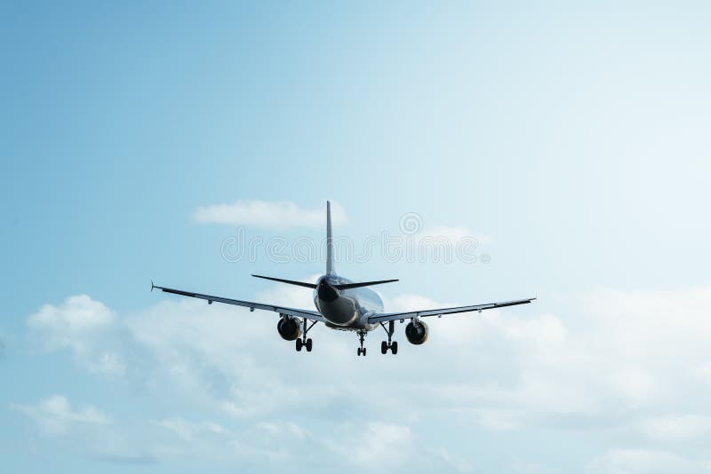 Commercial Aircraft Flying Low Stock Image - Image of approaching ...