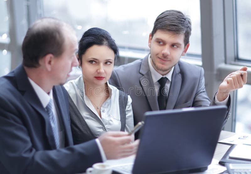 Rear View.group of Business People Using Laptop in Office Stock Photo ...