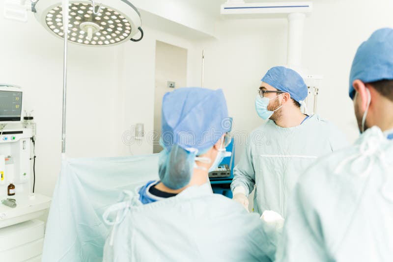 Surgeons Looking Happy after Surgery Stock Image - Image of hospital ...