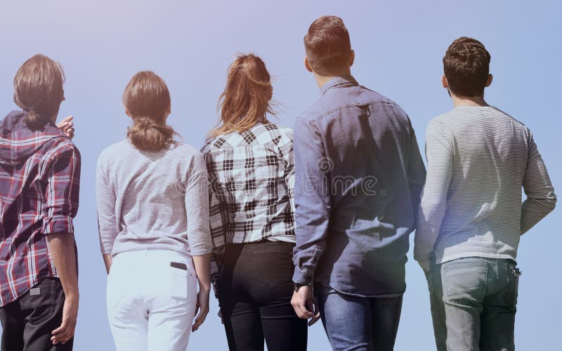 Rear View.a Group of Young People Looking at Copy Space Stock Photo ...