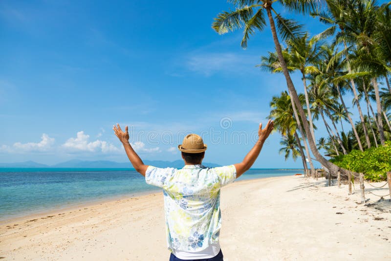 Rear View Happy Young Asian Man on the Tropical Beach. Stock Image ...