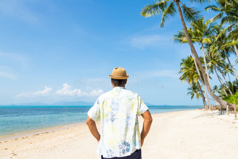 Rear View Happy Young Asian Man on the Tropical Beach. Stock Photo ...