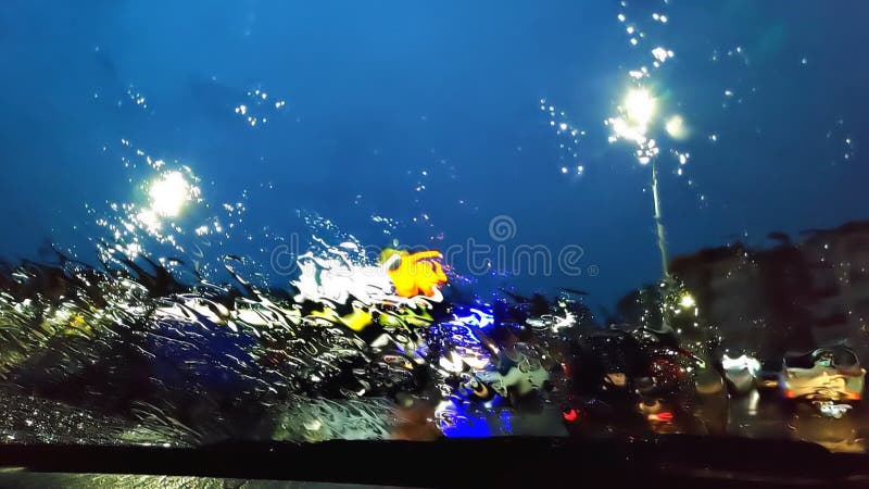 Rear View from Inside Mirror Rain Water Drops Falling on Car Window ...