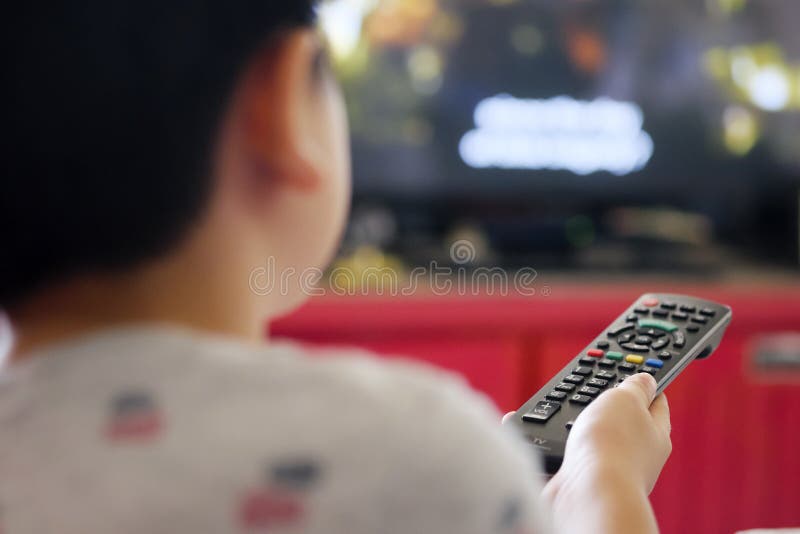 Kid Using TV Remote Control Stock Image - Image of light, shallow ...