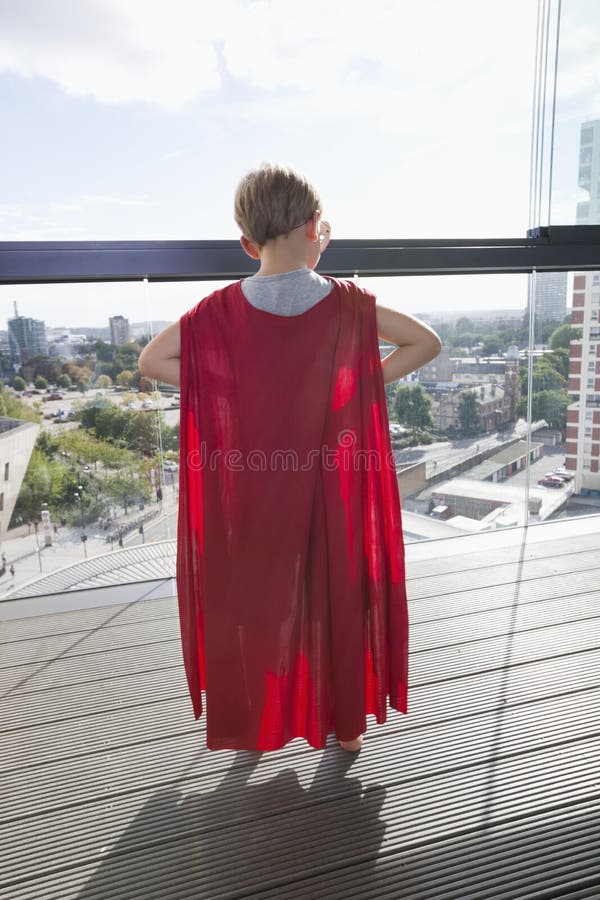 Rear View of Little Boy in Superhero Costume at Home Stock Image ...