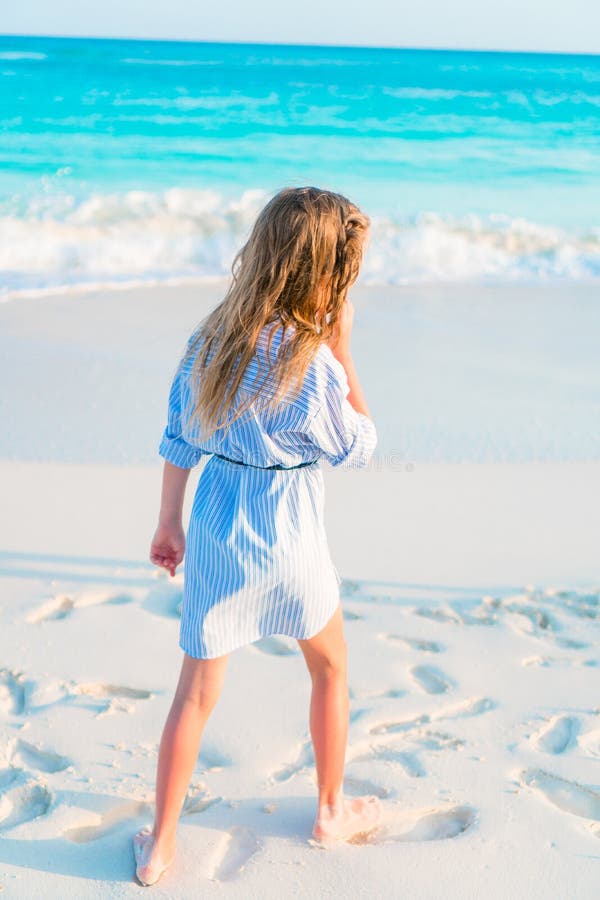 Rear View of Little Girl at Beach on Summer Vacation Stock Image ...