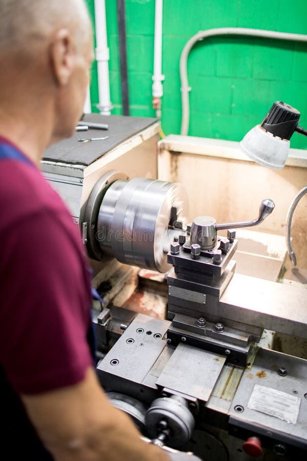 Lathe operator at work stock photo. Image of working - 124155756 Lathe operator at work stock photo. Image of working - 124155756