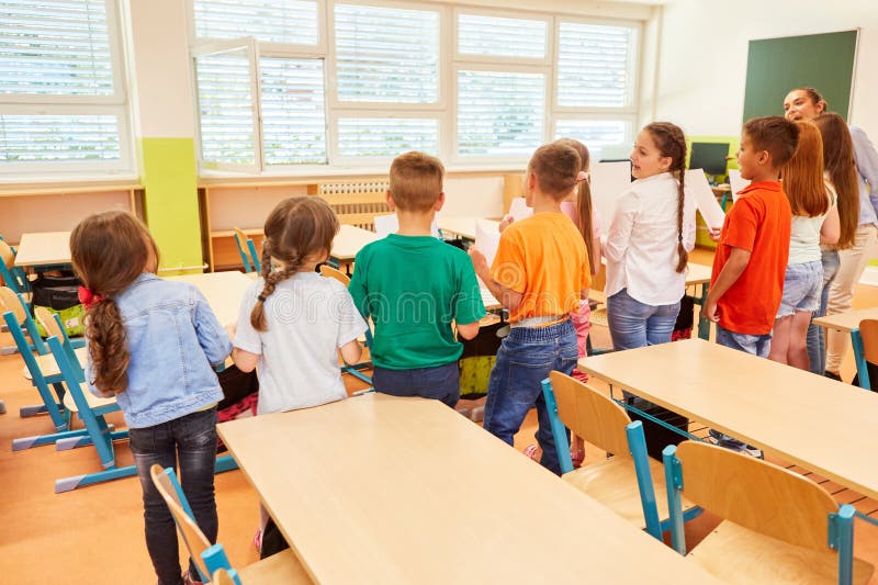 Group of Students Standing Together in Class Stock Image - Image of ...