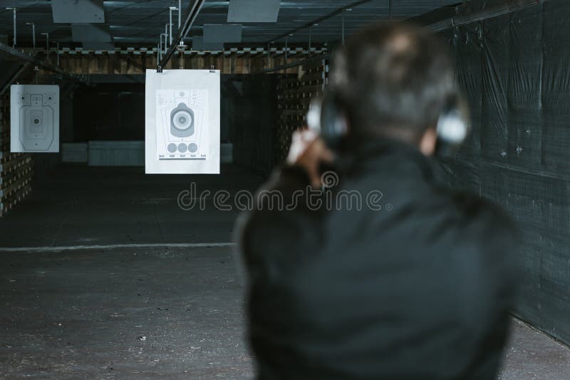 297 Man Gun Rear View Stock Photos - Free & Royalty-Free Stock Photos ...