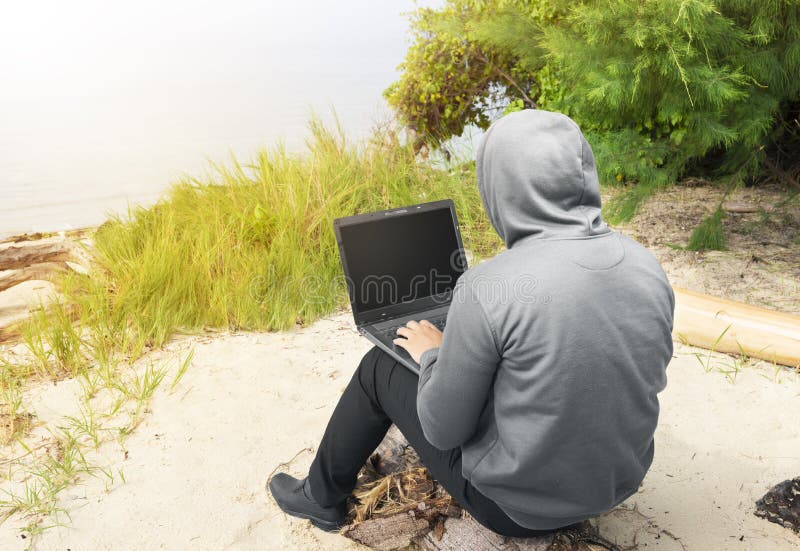 Rear View of Man in Black Hoodie Using Laptop Stock Image - Image of ...