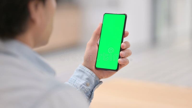 Rear View, Man Holding Smartphone with Green Chroma Key Screen Stock ...