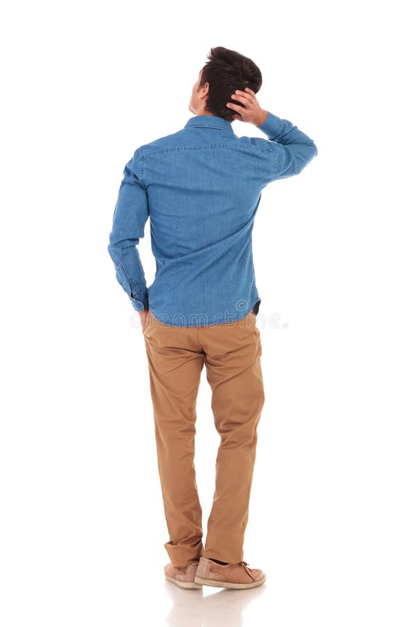 Rear View Of Man Looking To Side While Scratching Head Stock Photo ...
