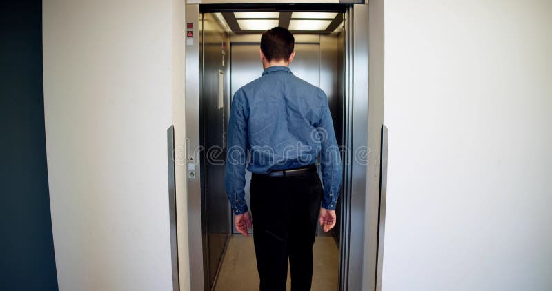 Rear View of a Man stock image. Image of standing, wait - 316929713