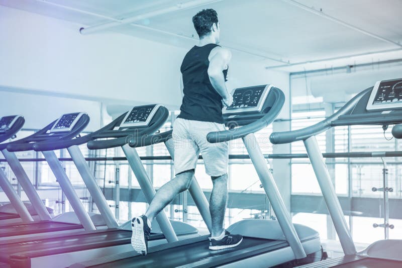 Rear View of Man Running on Treadmill Stock Photo - Image of handsome ...