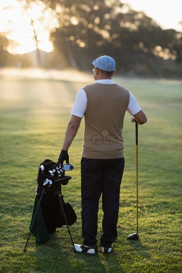 Rear View of Man Standing at Golf Course Stock Image - Image of mature ...