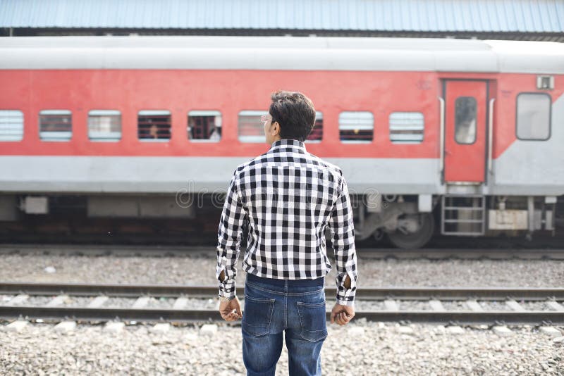 Rear View of Man Standing at Railroad Station Stock Image - Image of ...