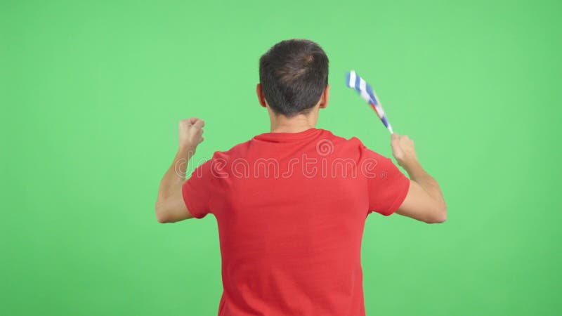 Rear View of a Man Waving a Cuban Pennant Stock Video - Video of back ...
