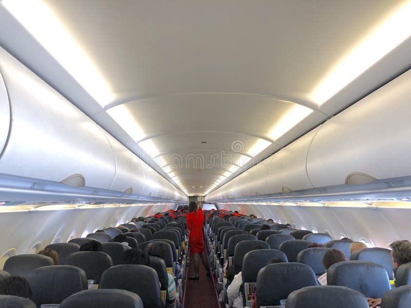 Interior of Airplane with Passengers Editorial Stock Image - Image of ...