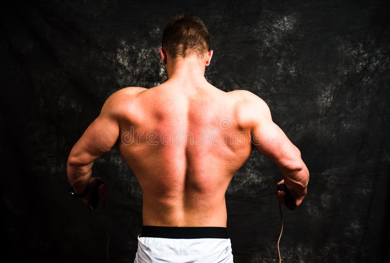 Rear View of Masculine Man Holding a Jumping Rope Stock Photo - Image ...