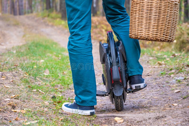 Rear View of Men`s Legs on an Electric Unicycle Stock Photo - Image of ... Rear View of Men`s Legs on an Electric Unicycle Stock Photo - Image of ...