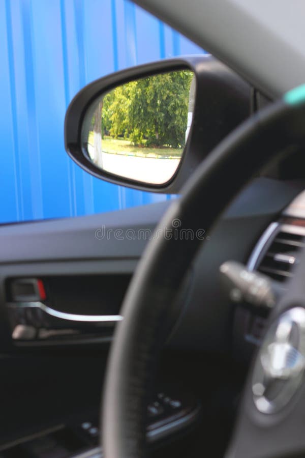 Rear-view Mirror and Steering Wheel of the Car Stock Photo - Image of ...