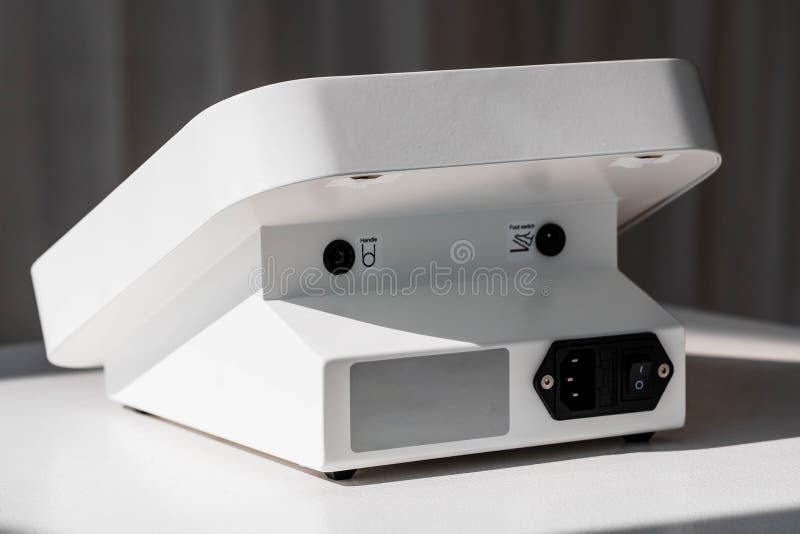 Rear View of Modern White Electronic Device on White Surface with ...