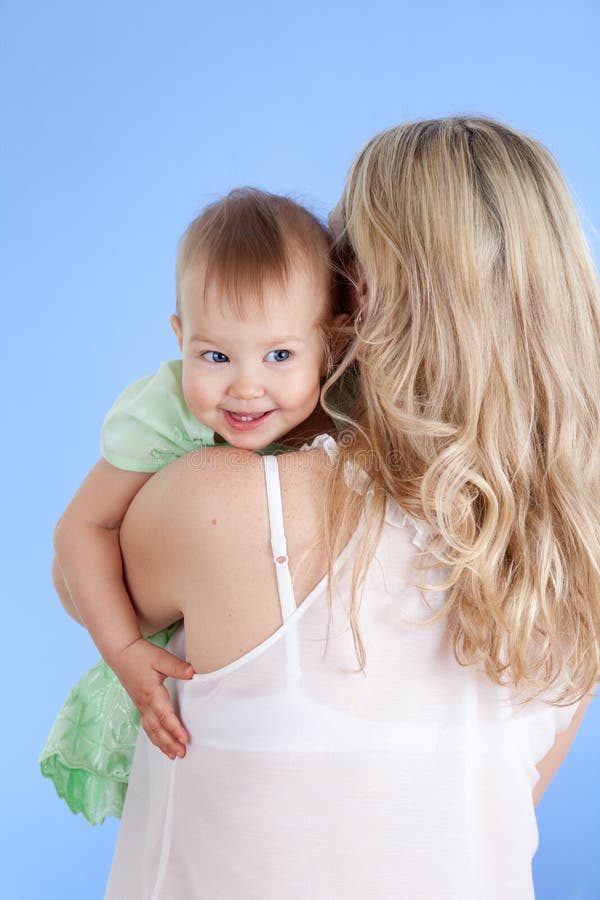 Rear View of Mother with Child Over Shoulder Stock Photo - Image of ...