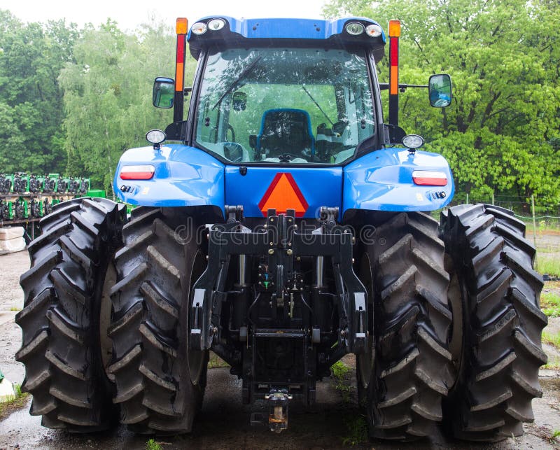 Rear View of the New Blue Tractor Stock Photo - Image of tractor ...