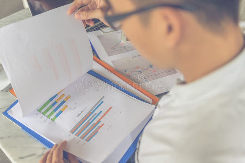 Rear View of Office Man Reading Report Stock Image - Image of ...