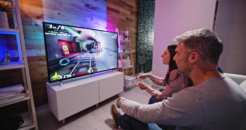 Rear View of an People Playing Video Games Stock Photo - Image of ...