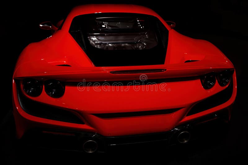 Rear View of Red Sport Car on the Dark Background. Editorial Stock ...