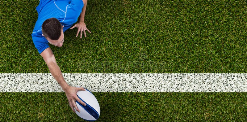 Composite Image of Rear View of Rugby Player Lying in Front with Ball ...